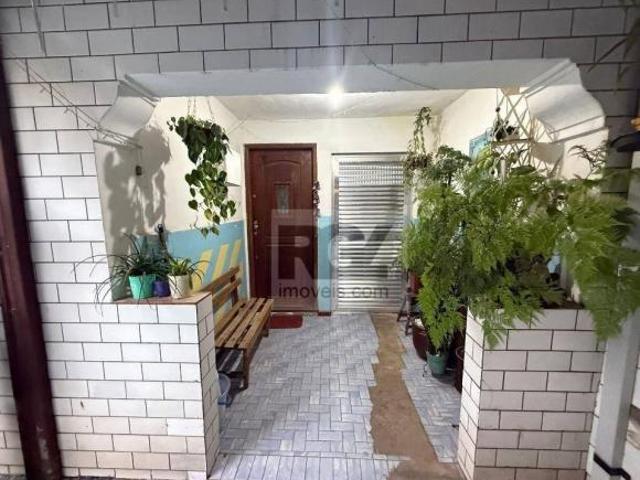 Casa com 5 dormitórios à venda, 150 m² por R$ 950.000,00 Estuário Santos/SP