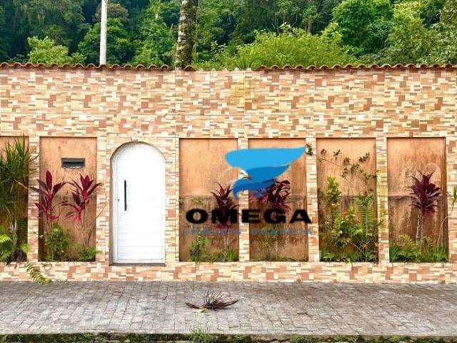 Casa com 5 dormitórios à venda, 250 m² por R$ 1.650.000,00 Guaiuba Guarujá/SP