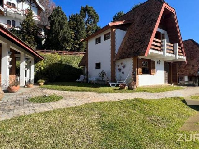 Casa com 5 dormitórios à venda, 280 m² por R$ 1.400.000,00 Jardim Embaixador Campos do Jordão/SP