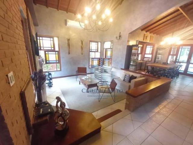 Casa com 5 dormitórios à venda, 280 m² por R$ 4.500.000,00 Riviera Módulo 28 Bertioga/SP