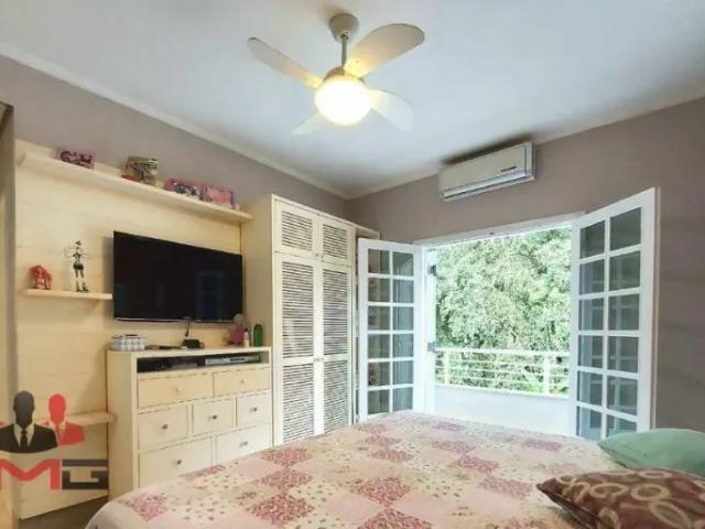 Casa com 5 dormitórios à venda, 297 m² por R$ 4.500.000,00 Riviera Módulo 20 Bertioga/SP