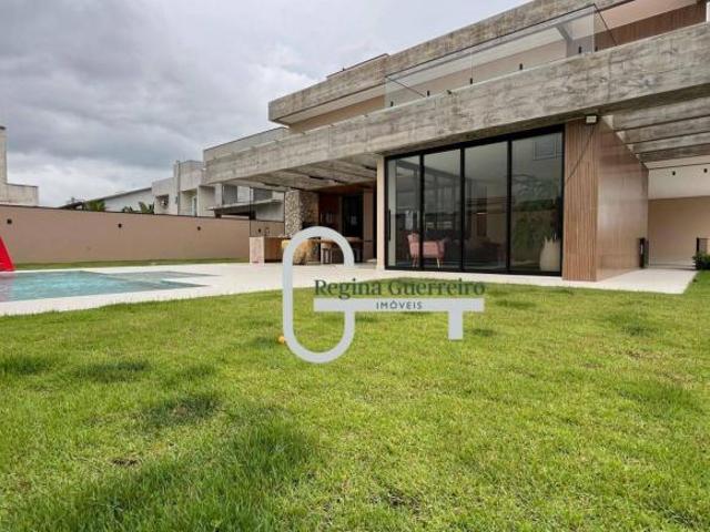 Casa com 5 dormitórios à venda, 290 m² por R$ 2.900.000,00 Condomínio Flora Rica Peruíbe/SP