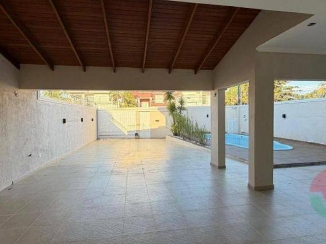 Casa com 5 dormitórios à venda, 293 m² por R$ 1.380.000 Balneário Praia do Pernambuco Guarujá/SP