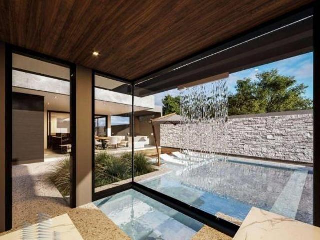 Casa com 5 dormitórios à venda, 325 m² por R$ 7.500.000,00 Riviera Módulo 16 Bertioga/SP