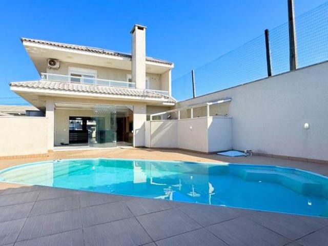 Casa com 5 dormitórios à venda, 327 m² por R$ 1.390.000,00 Cohapar Guaratuba/PR