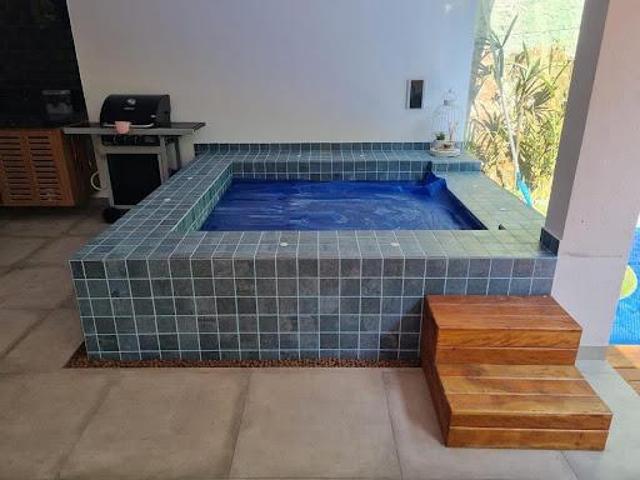 Casa com 5 dormitórios à venda, 320 m² por R$ 4.500.000,00 Condomínio Aruã Brisas Mogi das Cruze