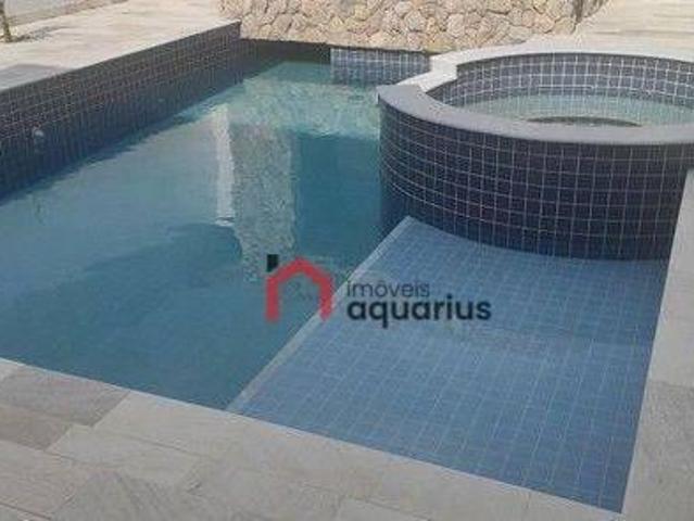 Casa com 5 dormitórios à venda, 380 m² por R$ 4.496.000,00 Condomínio Reserva do Paratehy São Jo