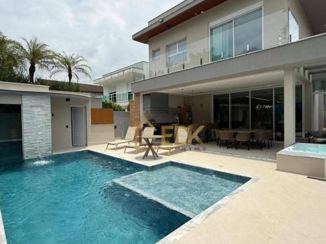 Casa com 5 dormitórios à venda, 380 m² por R$ 8.500.000 Riviera de São Lourenço Bertioga/SP