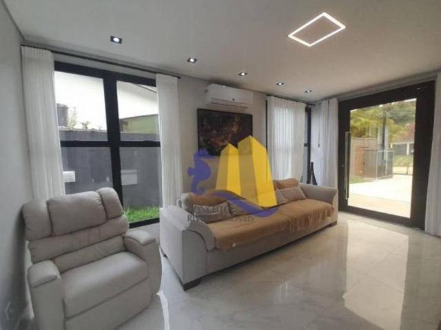Casa com 5 dormitórios à venda, 400 m² por R$ 5.000.000,00 Riviera Módulo 22 Bertioga/SP