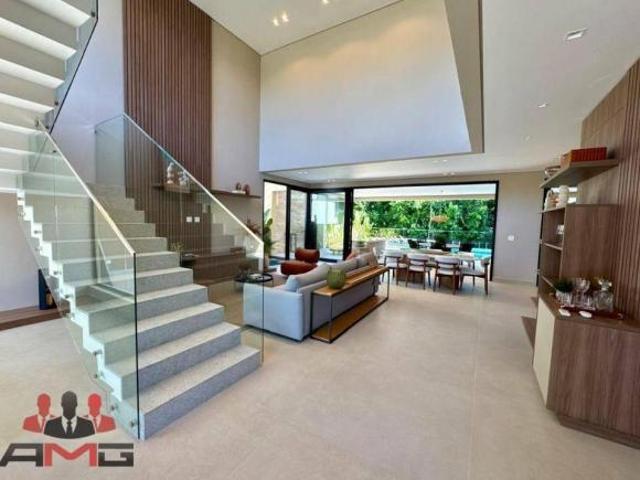 Casa com 5 dormitórios à venda, 410 m² por R$ 7.800.000,00 Riviera Módulo 16 Bertioga/SP