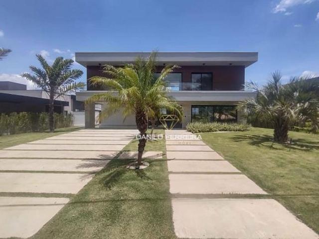 Casa com 5 dormitórios à venda, 457 m² por R$ 4.500.000,00 Condomínio Portal Japy Golf Club Jacaré