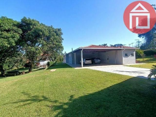 Casa com 5 dormitórios à venda, 458 m² por R$ 2.650.000,00 Condomínio Jardim das Palmeiras Braga