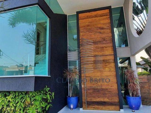Casa com 5 dormitórios à venda, 458 m² por R$ 6.400.000,00 Riviera Módulo 24 Bertioga/SP