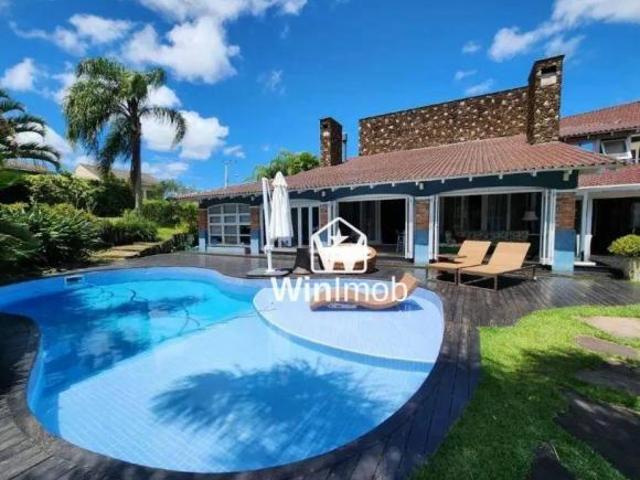Casa com 5 dormitórios à venda, 450 m² por R$ 3.800.000,00 Condomínio Cantegril Viamão/RS