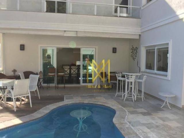 Casa com 5 dormitórios à venda, 450 m² por R$ 3.800.000,00 Tamboré Santana de Parnaíba/SP
