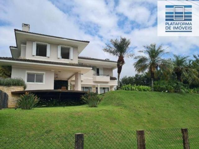 Casa com 5 dormitórios à venda, 545 m² por R$ 3.900.000,00 Condomínio Jardim das Palmeiras Braga