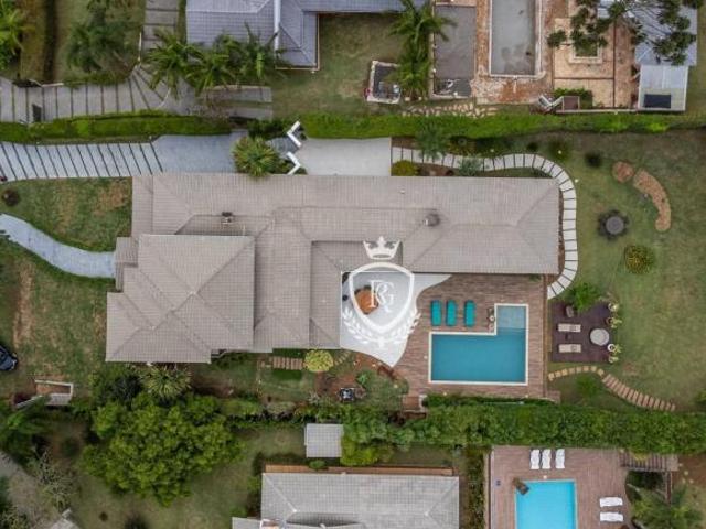 Casa com 5 dormitórios à venda, 550 m² por R$ 3.300.000,00 Condomínio Patrimônio do Carmo São Ro