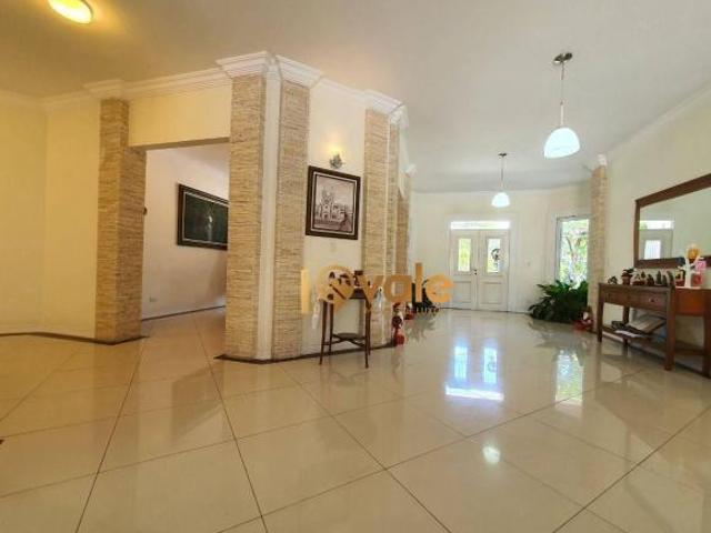 Casa com 5 dormitórios à venda, 574 m² por R$ 2.690.000,00 Condomínio Colonial Village I Pindamo