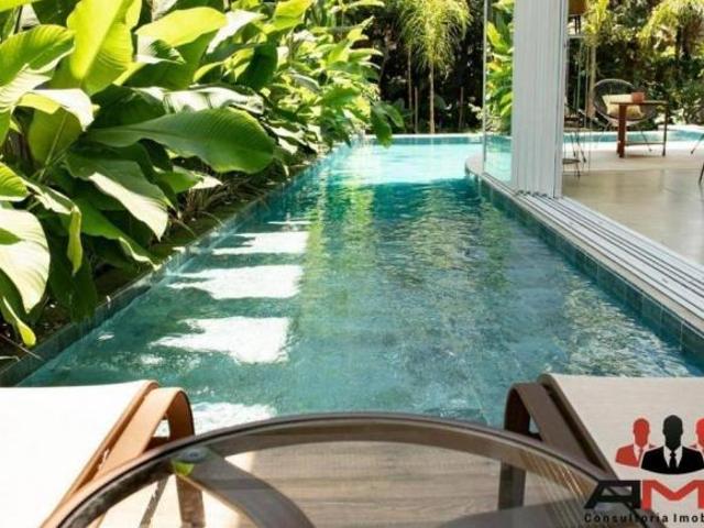 Casa com 5 dormitórios à venda, 583 m² por R$ 6.300.000,00 Riviera Módulo 28 Bertioga/SP