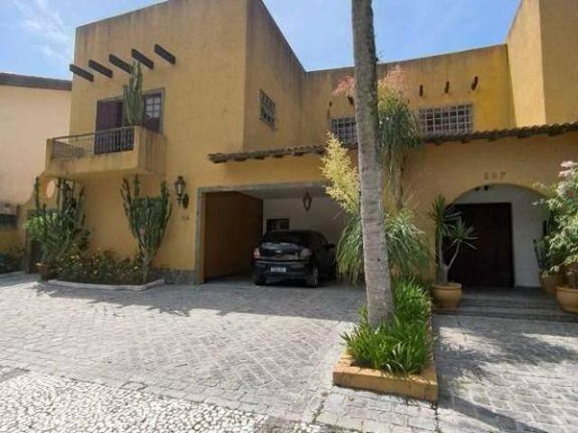 Casa com 5 dormitórios à venda, 604 m² por R$ 7.500.000,00 Riviera Módulo 20 Bertioga/SP