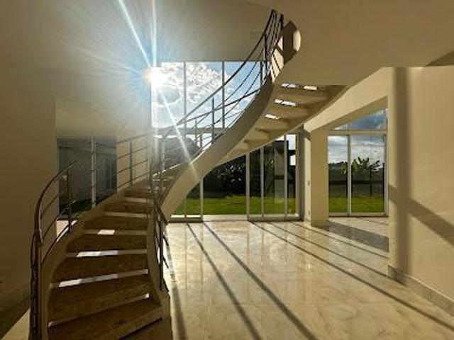 Casa com 5 dormitórios à venda, 600 m² por R$ 3.700.000,00 Condomínio Phillipson Park Americana/