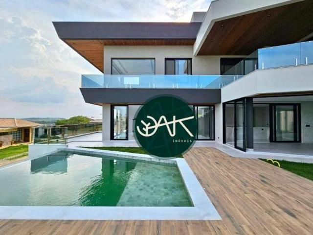 Casa com 5 dormitórios à venda, 600 m² por R$ 7.000.000,00 Condomínio Reserva do Paratehy São Jo