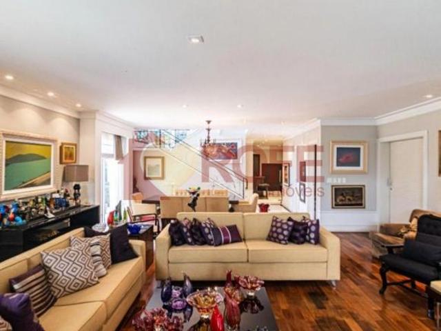 Casa com 5 dormitórios à venda, 667 m²