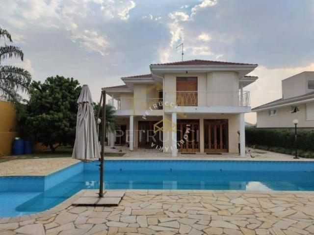 Casa com 5 dormitórios à venda, 690 m² por R$ 4.800.000,00 Loteamento Alphaville Campinas Campin