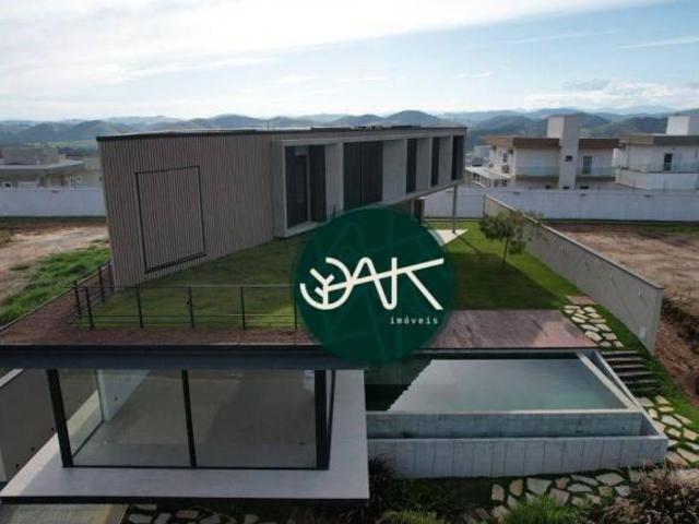Casa com 5 dormitórios à venda, 835 m² por R$ 7.900.000,00 Condomínio Reserva do Paratehy São Jo