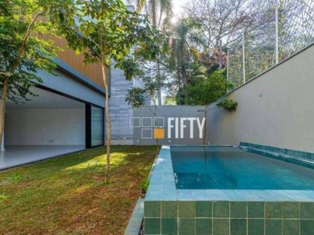 Casa com 5 dormitórios à venda, 869 m²