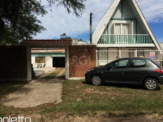 Casa com 5 Dormitórios Para Comprar, 306 m² por R$ 1.350.000,00 Cassino Rio