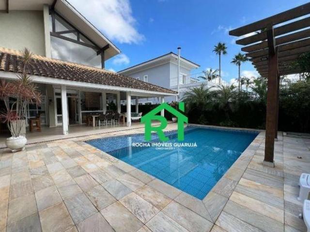 Casa com 5 dormitórios sendo 5 suites à venda, 525 m² por R$ 2.500.000,00 Acapulco Guarujá/SP