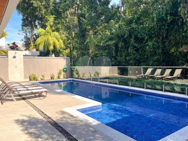 Casa com 5 quartos à venda em Riviera SP