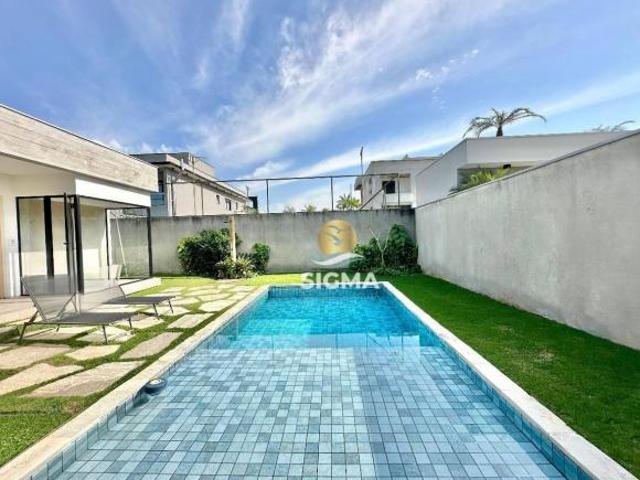 Casa com 5 Suítes à venda no Condomínio Jardim Acapulco Guarujá/SP