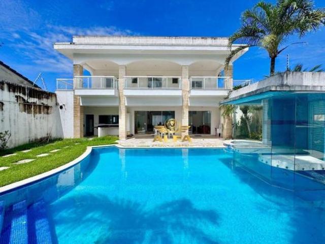 Casa com 5 suítes, piscina e 2 churrasqueiras a 2 quadras da Praia da Enseada – Alfa Imóveis Guarujá