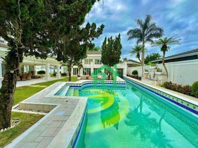 Casa com 6 dormitórios à venda, 1300 m² por R$ 8.300.000,00 Acapulco Guarujá/SP