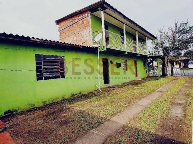 Casa com 6 dormitórios à venda, 215 m² por R$ 400.000,00 Ipiranga Sapucaia do Sul/RS