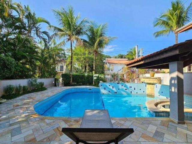 Casa com 6 dormitórios à venda, 336 m² por R$ 6.758.900,00 Riviera de São Lourenço Bertioga/SP