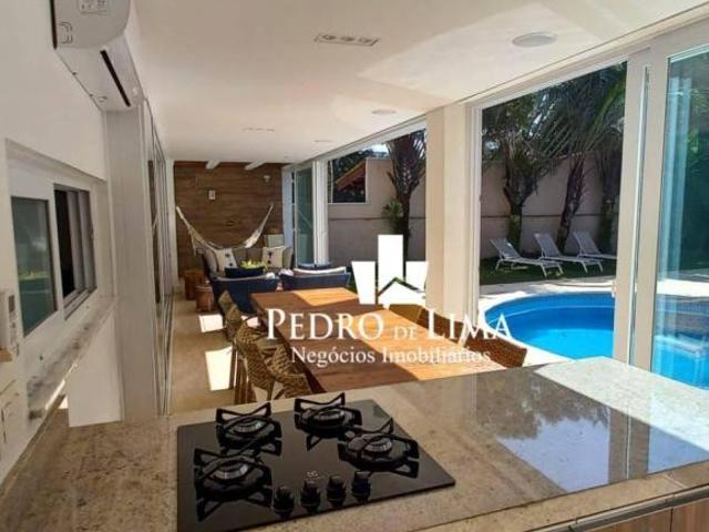 Casa com 6 dormitórios à venda, 404 m² por R$ 11.000.000,00 Riviera Módulo 4 Bertioga/SP