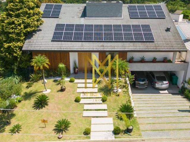 Casa com 6 dormitórios à venda, 630 m² por R$ 4.000.000,00 Residencial Dez Alphaville Santana