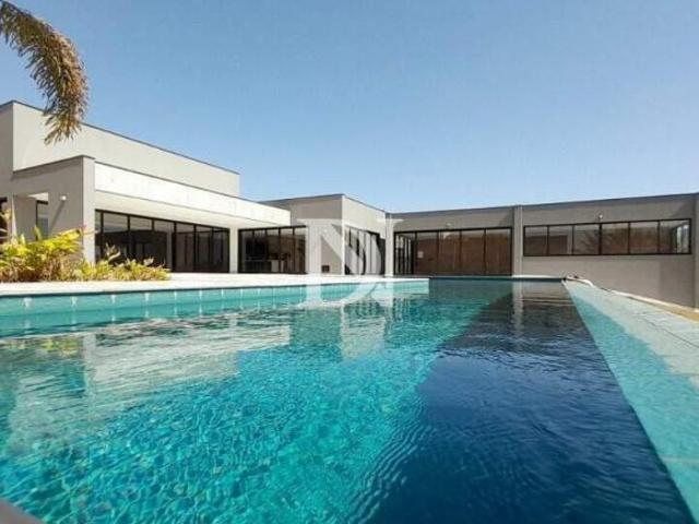 Casa com 6 dormitórios à venda, 890 m² por R$ 9.900.000,00 Condomínio Fazenda Alvorada Porto Fel