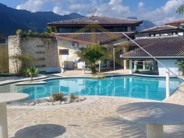 Casa com 6 dormitórios à venda, 915 m² por R$ 3.500.000,00 Morada da Praia Bertioga/SP