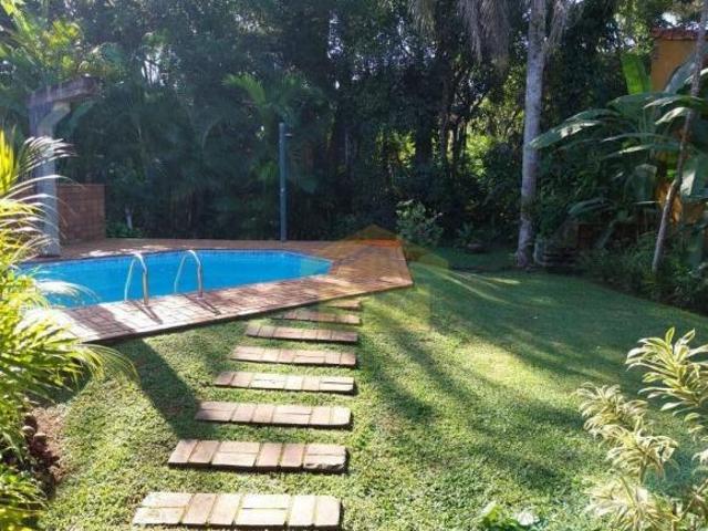 Casa com 6 dormitórios à venda por R$ 2.000.000,00 Riviera Bertioga/SP