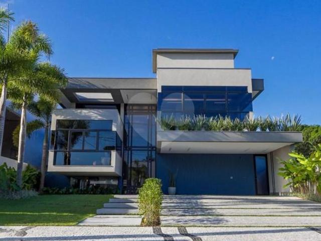 Casa com 6 quartos à venda em Riviera SP