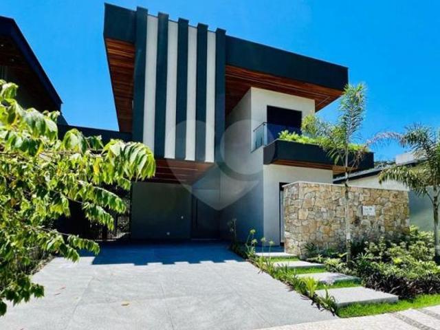 Casa com 6 quartos à venda em Riviera SP
