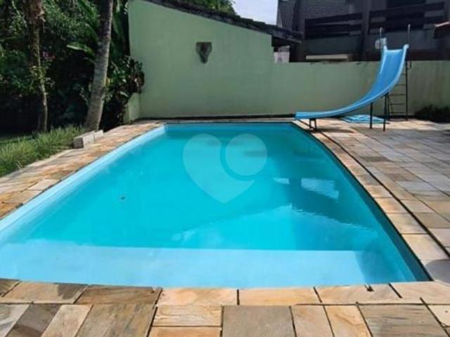 Casa com 6 quartos à venda em Riviera SP