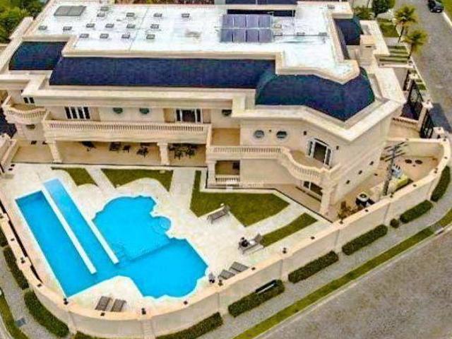 Casa com 7 dormitórios à venda, 1762 m² Acapulco Guarujá/SP