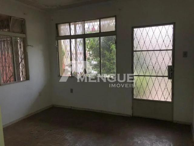 Casa com 7 dormitórios e 5 vagas de garagem, à venda no bairro Cristo Redentor em Porto Alegre com 3