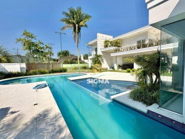 Casa com 7 suítes à venda no Condomínio Jardim Acapulco Guarujá/SP