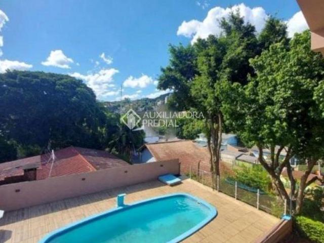 Casa com 03 quartos sendo uma suite no bairro Vila Nova em Novo Hamburgo